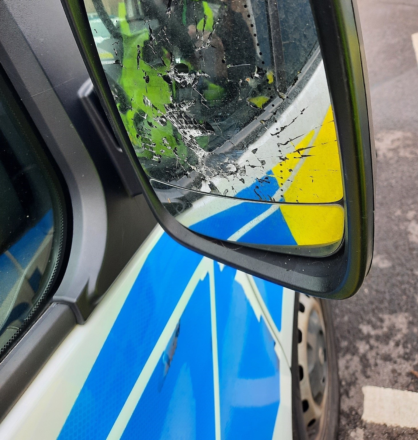 Motorcyclist who goaded officers and smashed their wing mirror gets ...